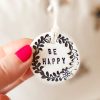 Porcelain be happy token – Amanda Mercer